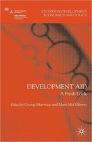 Development Aid. A Fresh Look - George Mavrotas | Książka w Empik