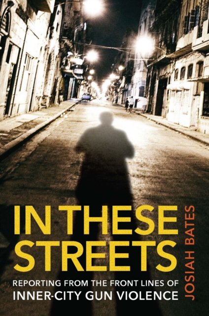 In These Streets - Josiah Bates | Książka w Empik