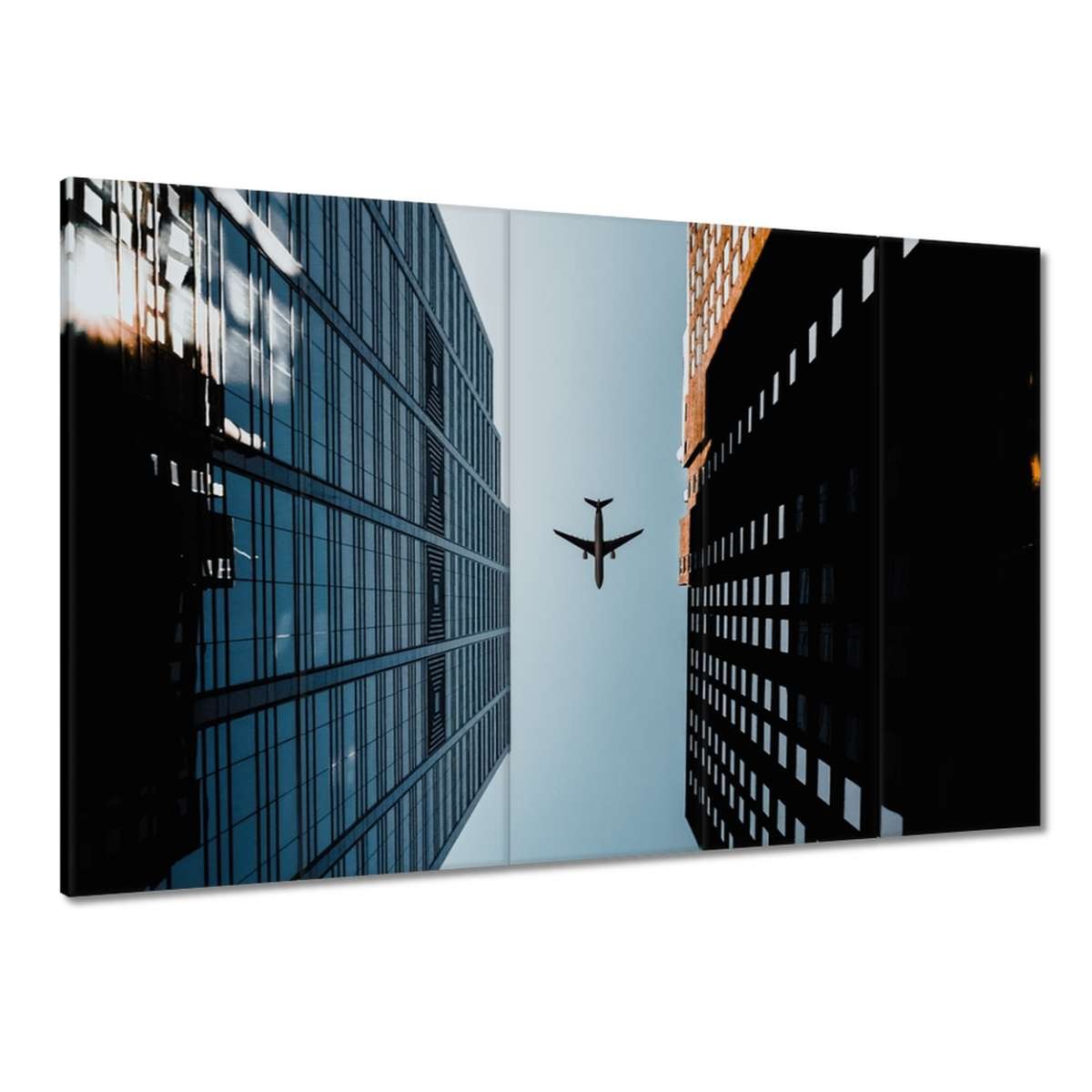 Obraz Samolot między budynkami, 100x70cm - ZeSmakiem | Sklep EMPIK.COM