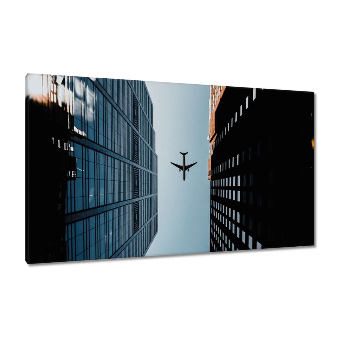 Obraz Samolot między budynkami, 120x70cm - ZeSmakiem | Sklep EMPIK.COM