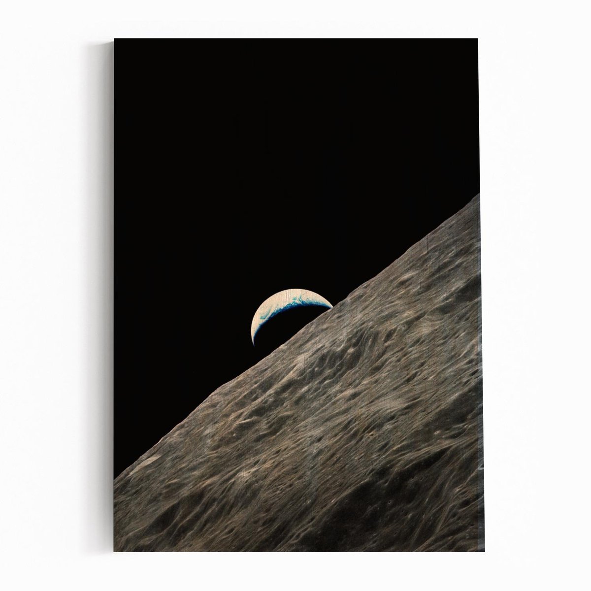 Plakat na drewnie Crescent Earth rises above the lunar horizon taken ...