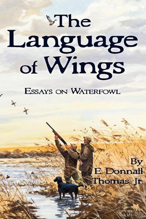 The Language of Wings - Thomas Jr. E. Donnall | Książka w Empik