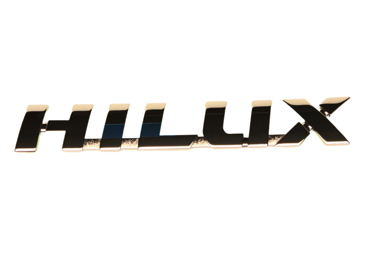 TOYOTA Hilux Chromowany emblemat tyl HILUX 75427-0K030 OE - Toyota ...