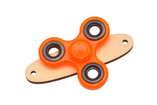 Pomarańczowy z brokatem spinner na podstawce do tablicy manipulacyjnej ...